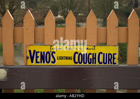 Advertisement for Veno's Lightning Cough Cure, superimposed on a ...
