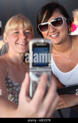 Two Young 20-Something Girls At Coffee Shop Stock Photo - Alamy