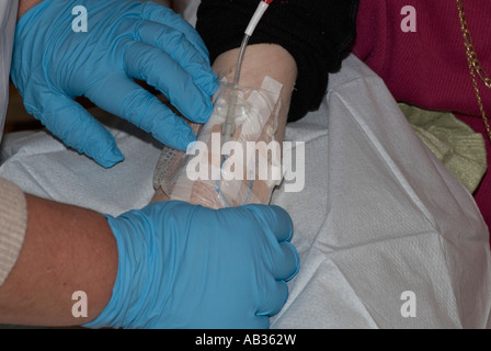 PICC line cleaning prior to removal of dressing Stock Photo - Alamy