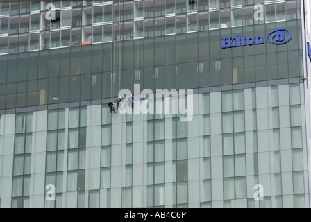 Three workers carrying out an abseil inspection of Beetham Tower, the ...