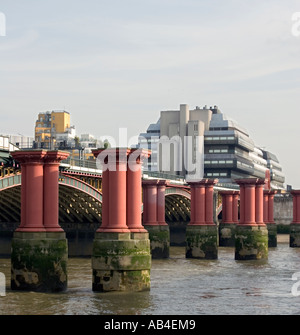 Empty bridge piers between two bridges over the river Thames in London ...