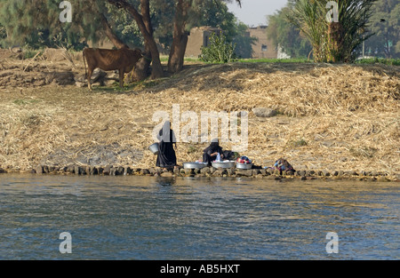 Rural women washing in the Nile river Egypt Stock Photo - Alamy