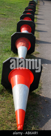 orange safety cones lying on the red running track at the stadium Stock ...