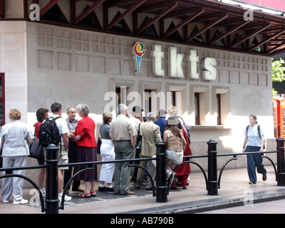 Queue of people waiting to purchase theatre tickets from booking Stock ...