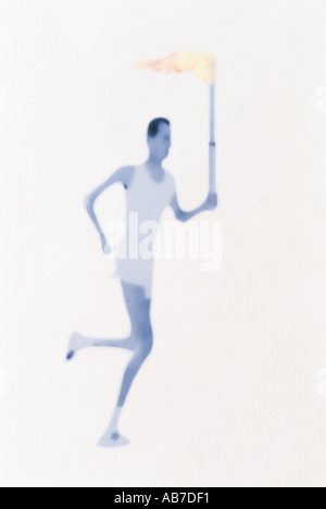 Caucasian athlete running with Olympic torch on park path Stock Photo ...