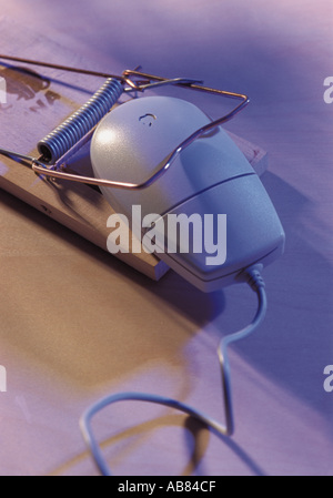 Computer mouse in mouse trap Stock Photo - Alamy