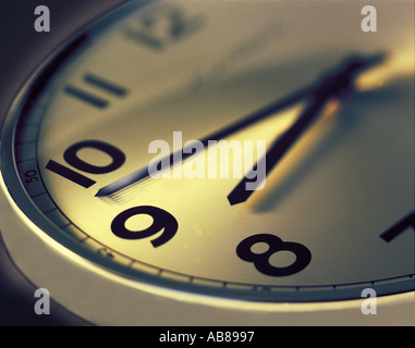 Close up of clock detail with moving hand close to 12 hours, concept of ...