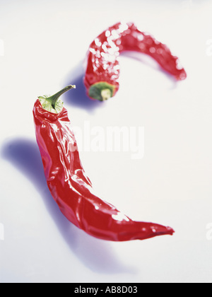 Close-up view of the red chilli peppers in water background. Texture of ...