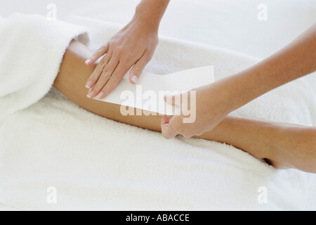 Woman being waxed Stock Photo - Alamy