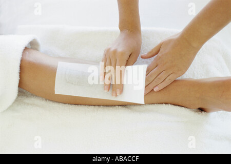 Woman being waxed Stock Photo - Alamy