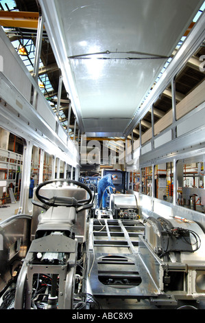 Assembly worker at bus and coach manufacturing company East Stock Photo ...