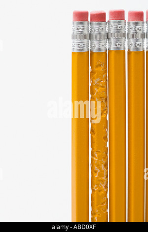 Pink pencils in a row, one blue pen is standing out, be different ...