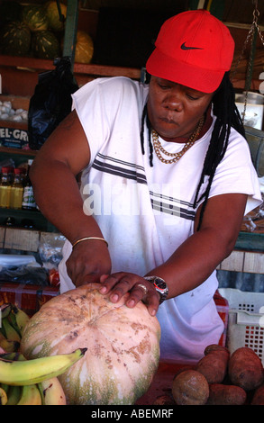 Market vendor at Roseau market, Dominica, Caribbean Stock Photo - Alamy