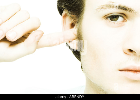 Man plugging his ears Stock Photo: 39035209 - Alamy