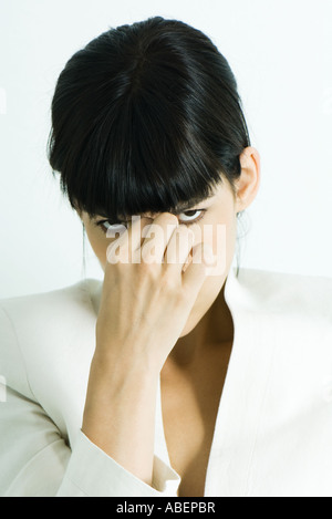 Woman glaring at camera, close-up Stock Photo - Alamy