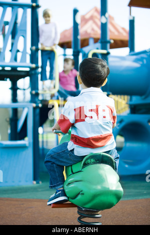 boy, rocking, playground, boys, playgrounds Stock Photo - Alamy