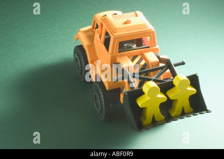 Toy Earth Mover with Wooden Children Figures Stock Photo - Alamy