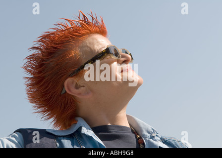 Older lady with a dyed red spikey punk hairstyle HOMER SYKES Stock ...