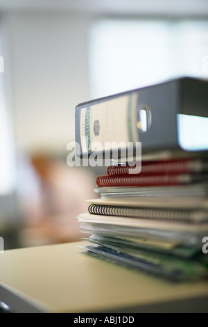 Office files on desk with pen and note to get work done and finished ...