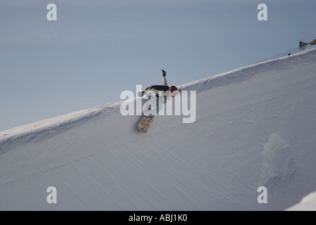 Snowboard girl and half pipe ride 8 Stock Photo - Alamy
