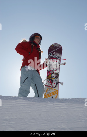 Beautiful snowboard girls on the half pipe edge 4 Stock Photo - Alamy
