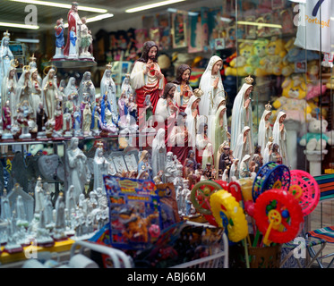 A souvenir shop in Fatima filled with candles in the shape of children ...