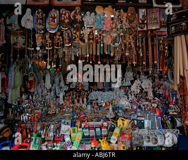 A souvenir shop in Fatima filled with religious figurines alongside ...