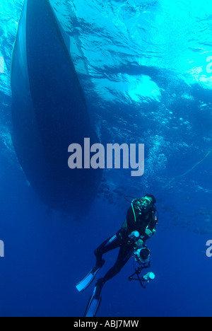 Scuba diver in Boat doing Back Roll Entry, Tamariu, Costa Brava, Spain ...
