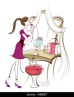 Side profile of a woman applying lipstick Stock Photo - Alamy