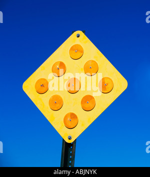 Low-angle view of sign on facade of Market Hall Foods on an overcast ...