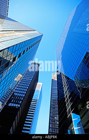 A low angle view of contemporary high rise residential towers featuring ...