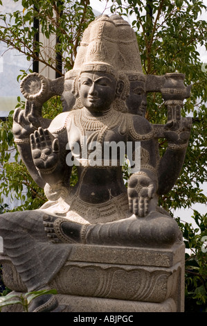 Stone statue four faced of Hindu creator god Brahma Stock Photo - Alamy
