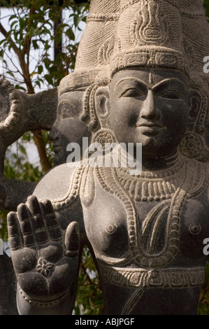 Stone statue four faced of Hindu creator god Brahma Stock Photo - Alamy