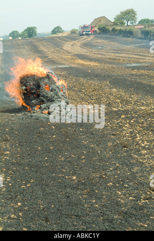 Bales of straw alight after the baler caught fire in barley field ...