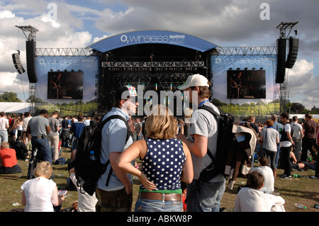 Festival goers enjoying the sun and music live at Glasgow Green Stock ...