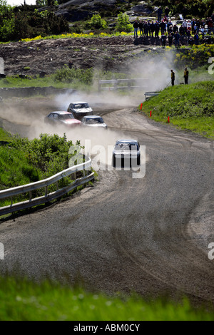 Folkracing banger racing cars speed through tracks of countryside ...