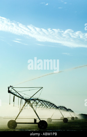 rolling sprinkler used for irrigation Stock Photo - Alamy