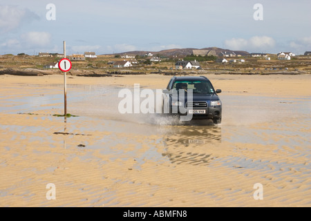 Crossing to Omey Island at low tide, Connemara, Galway, Ireland. Omey ...