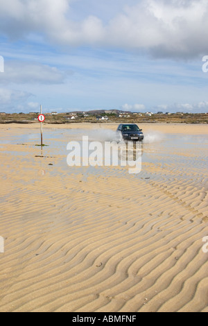 Crossing to Omey Island at low tide, Connemara, Galway, Ireland. Omey ...