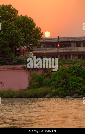 sunset over the River Ganges in Varanasi in India Stock Photo - Alamy