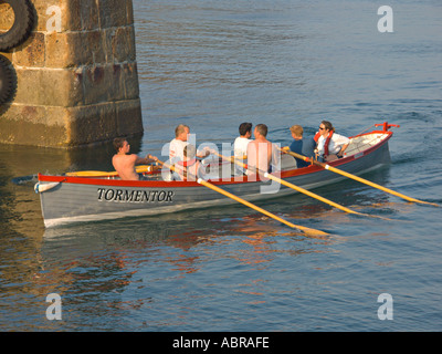 A pilot gig rowing team at Charlestown in Cornwall Stock Photo - Alamy