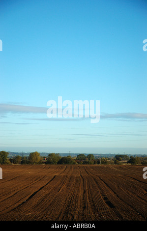 freshly plowed field in autumn with marks of tire Stock Photo - Alamy