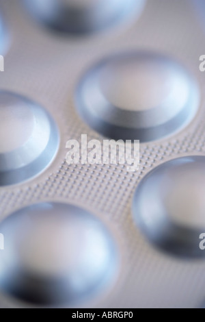 Medical drugs and pills in silver shiny package isolated on white ...