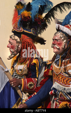 Guatemala Guatemalan fiesta Masked dancer in traditional dance costume ...