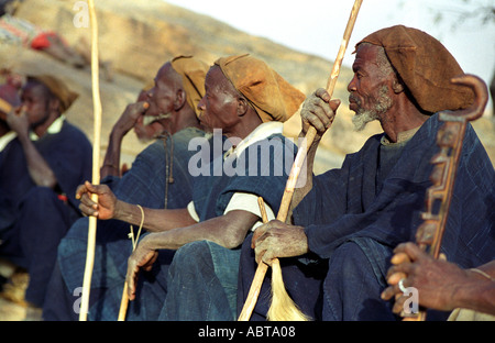 Dogon village elders in traditional indigo gowns and hats in Mali Stock ...