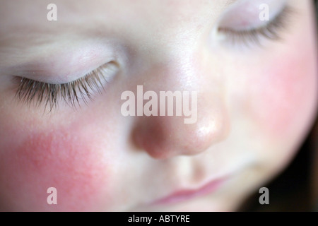 Close up portrait of sleeping toddler on parent's shoulder Stock Photo ...