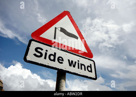 Road sign warning sign of side winds with wind sock and expected Stock ...