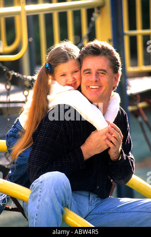Father and daughter spending quality time together in a park; Edmonton ...