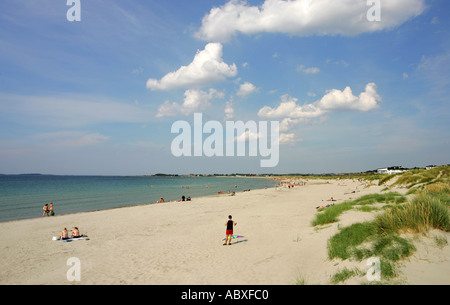 Sola beach outside Stavanger, Norway, lamppost stuck in sand dune with ...
