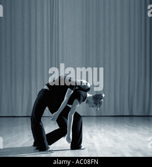 Portrait of teenage (16-17) ballet dancer bending over Stock Photo - Alamy